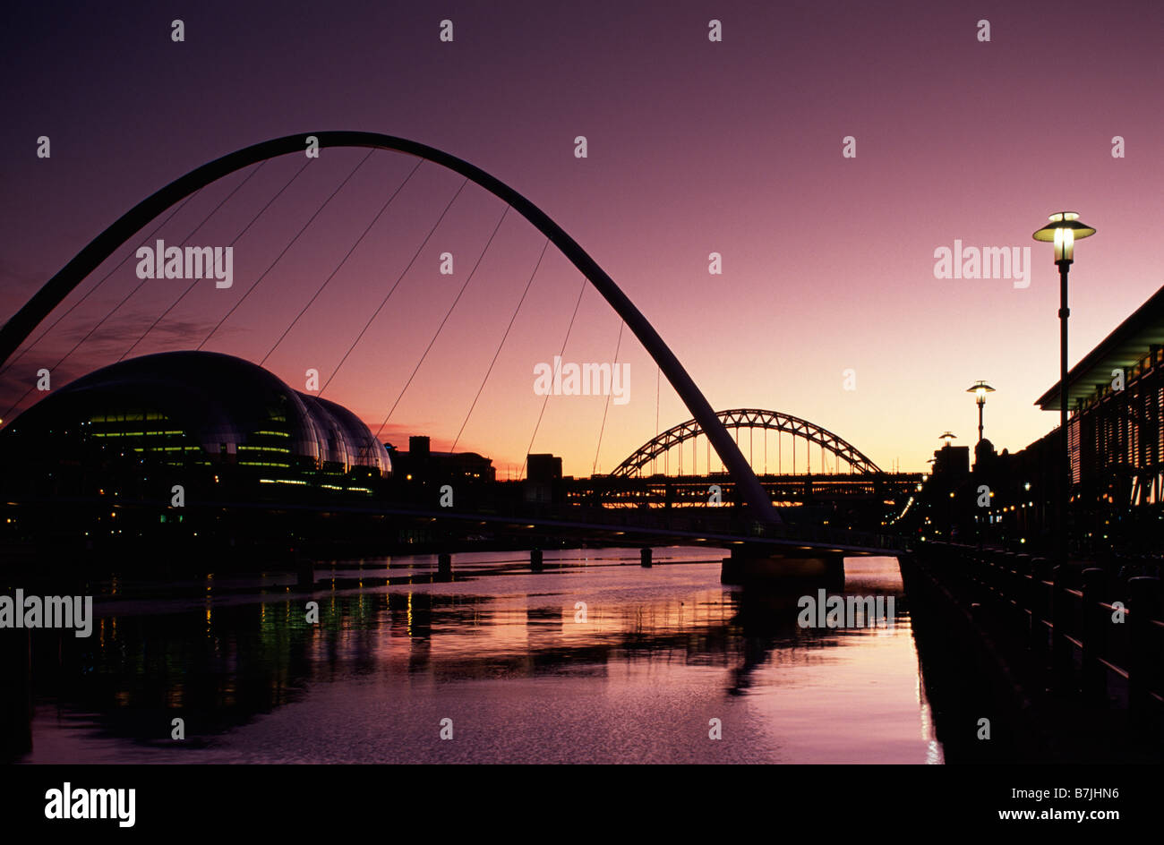 The Gateshead Millenium Bridge over the river Tyne at dusk Stock Photo ...