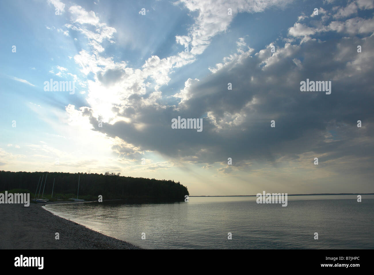 Clear Lake at sunset; Canada, Manitoba, Riding Mountain National Park ...