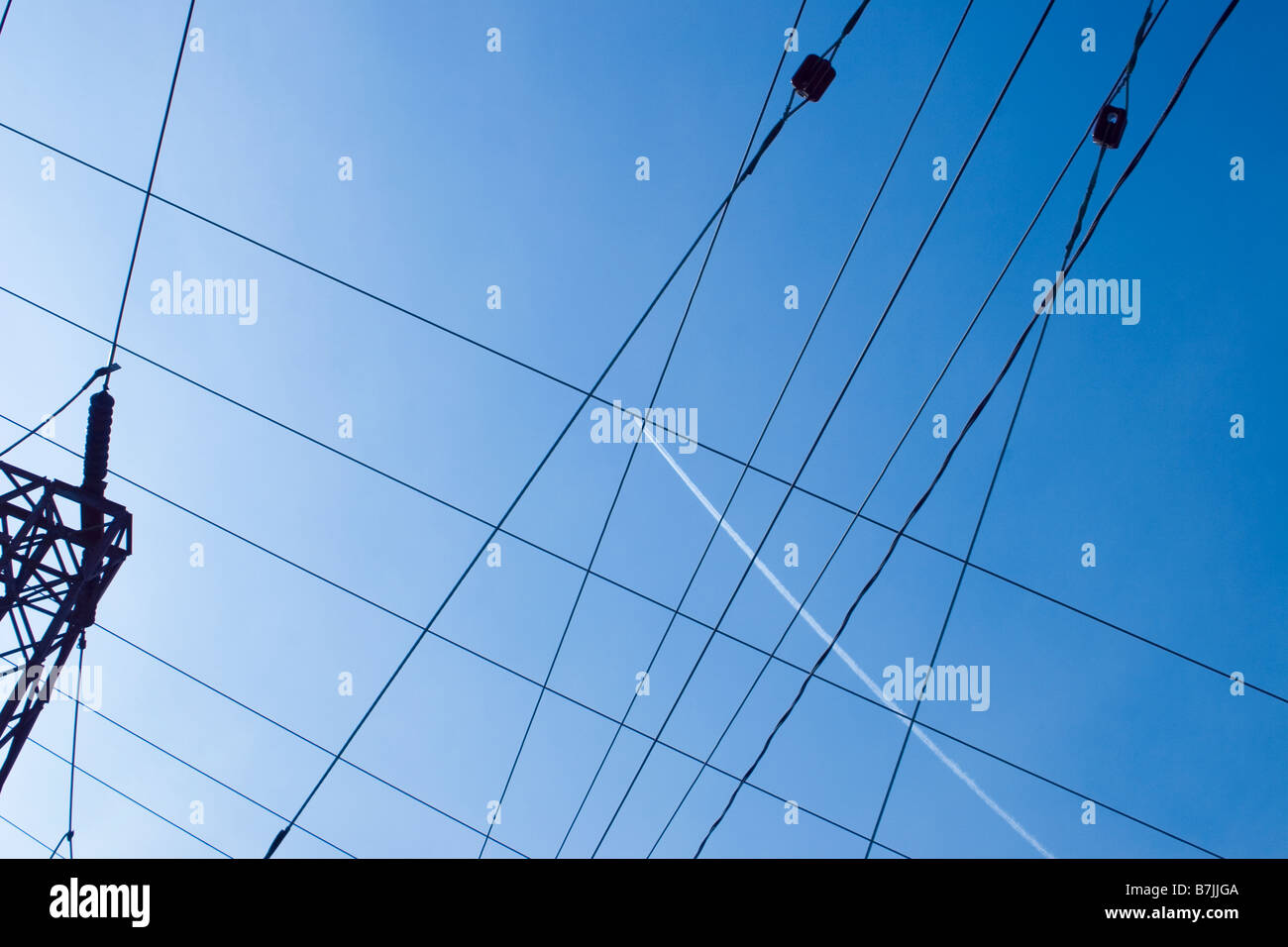Power lines and jet trail hi-res stock photography and images - Alamy