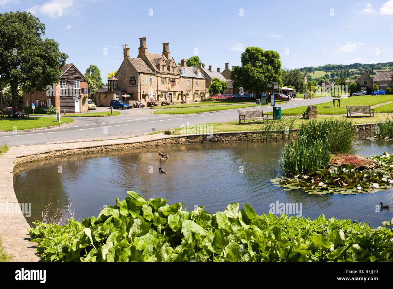 The duck pond in the Cotswold village of Willersey, Gloucestershire UK ...