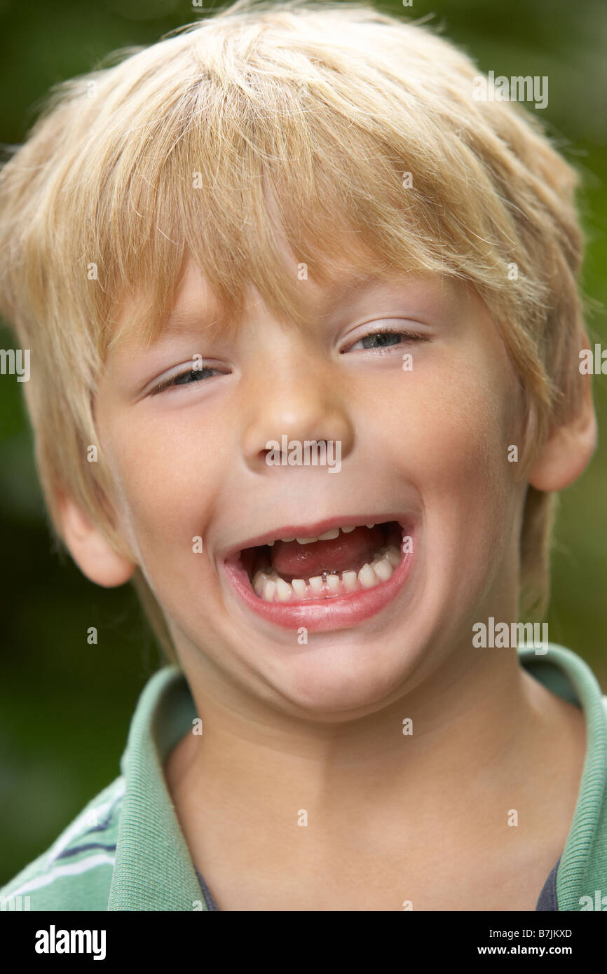 Portrait Of Young Boy Laughing Stock Photo - Alamy