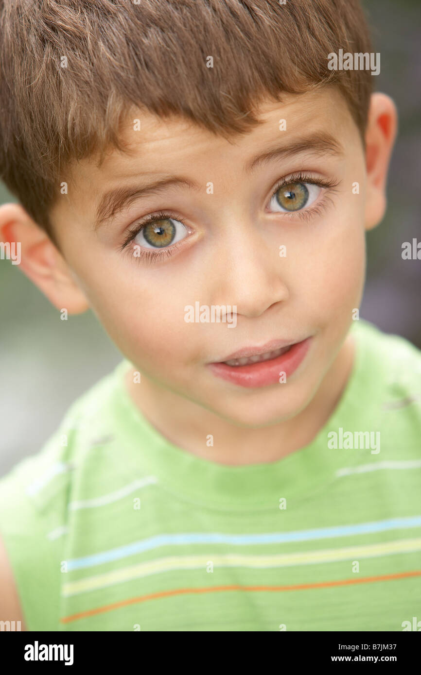 Portrait Of Young Boy Looking Surprised Stock Photo - Alamy