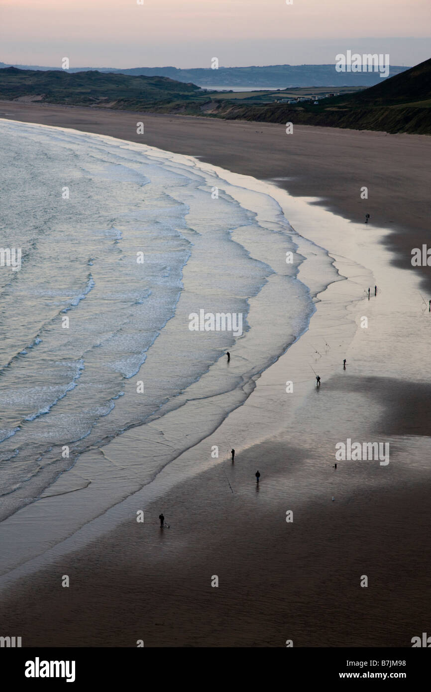 Sunset over Rhossili Bay in the Gower Wales Stock Photo - Alamy