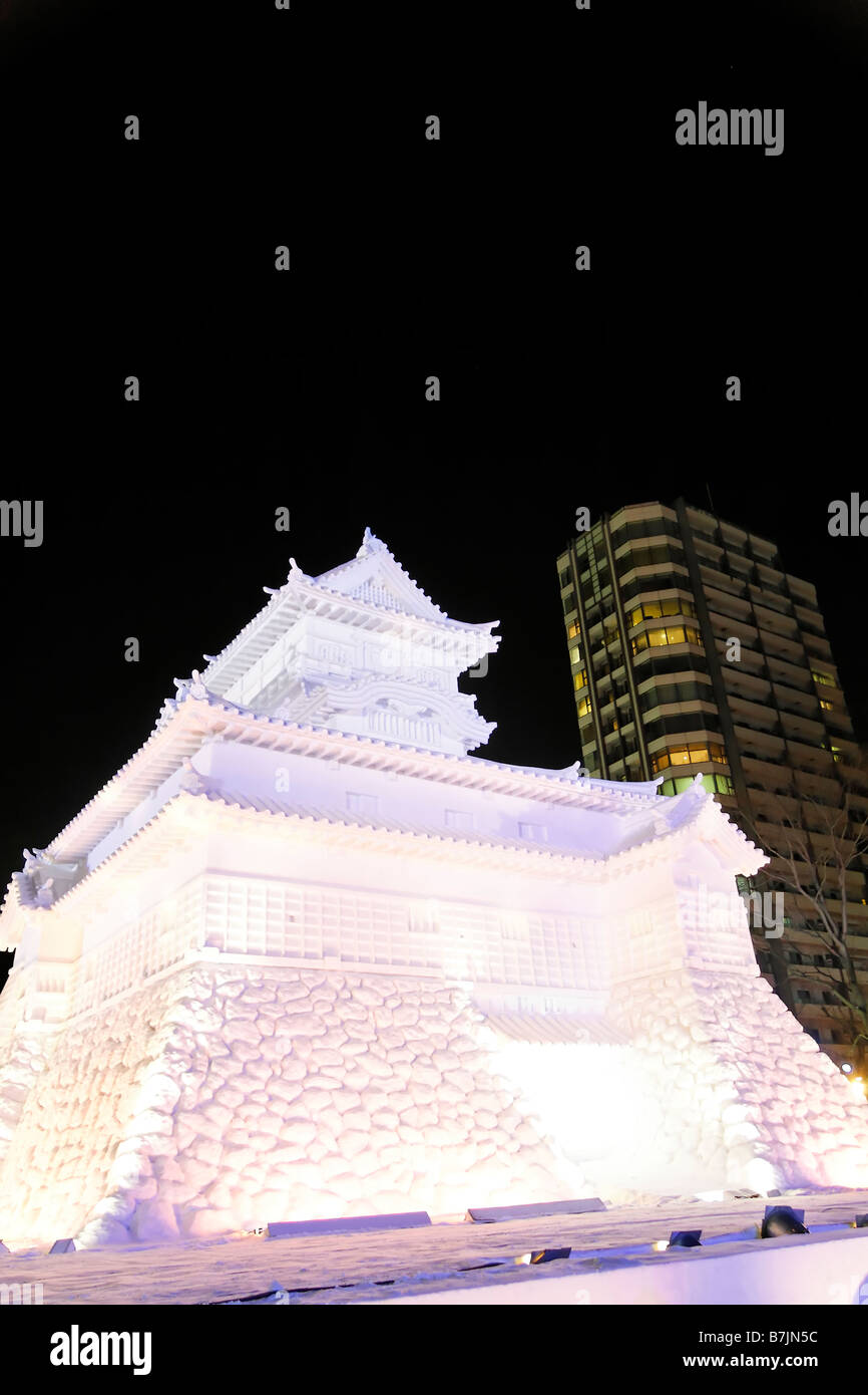 Night view of a giant snow replica of Inuyama castle at the Sapporo ...