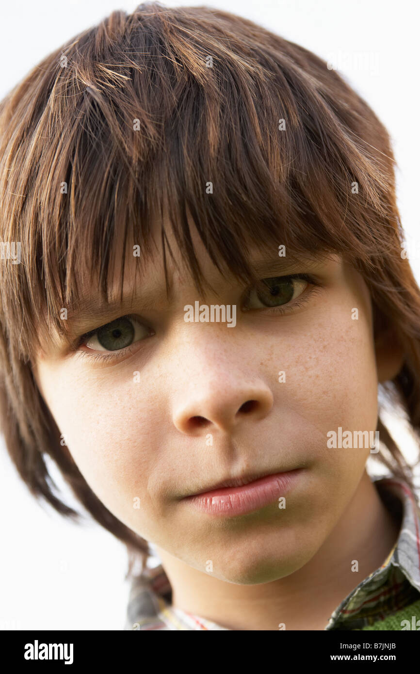Portrait Of Boy Frowning Stock Photo - Alamy