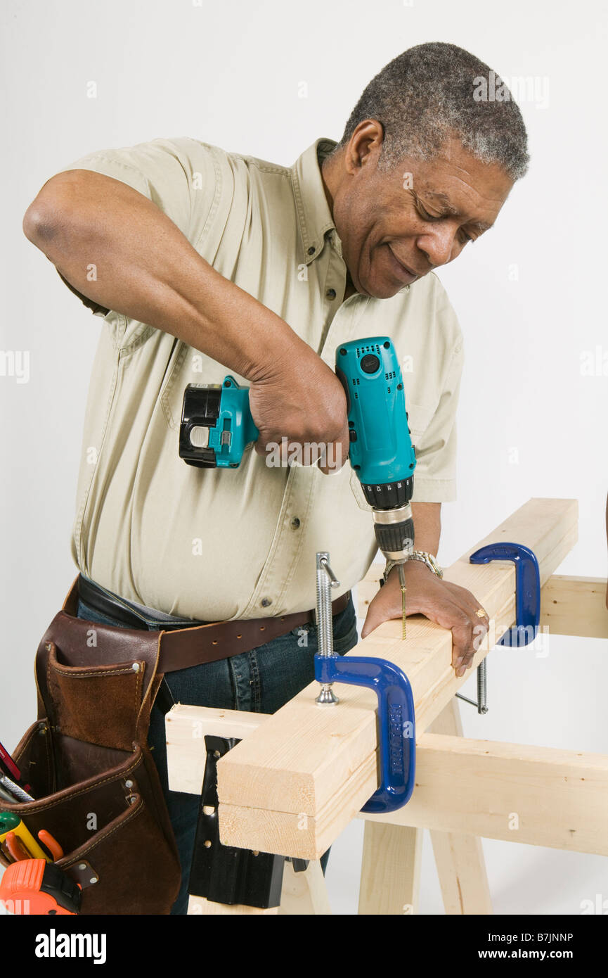 Man doing diy hi-res stock photography and images - Alamy