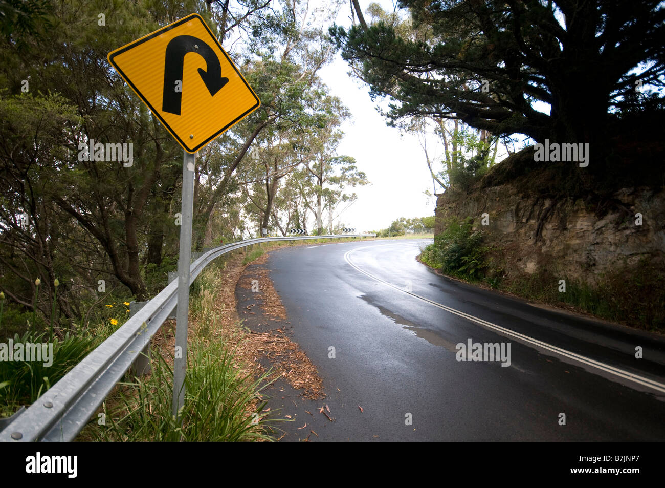 u turn sign post on cliff road Three sisters Blue Mountains New south ...