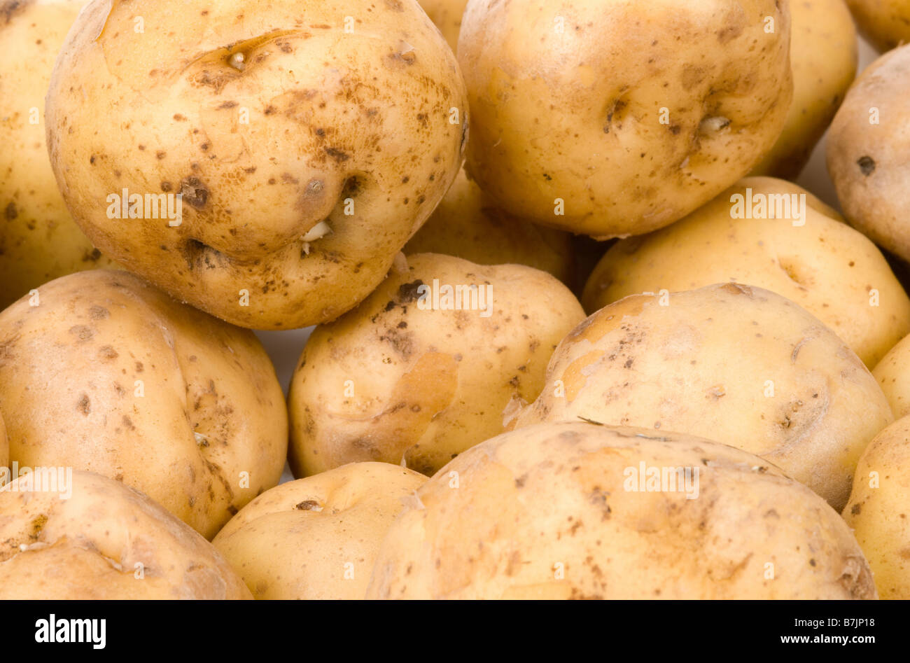 close up of fresh potatoes for background Stock Photo - Alamy