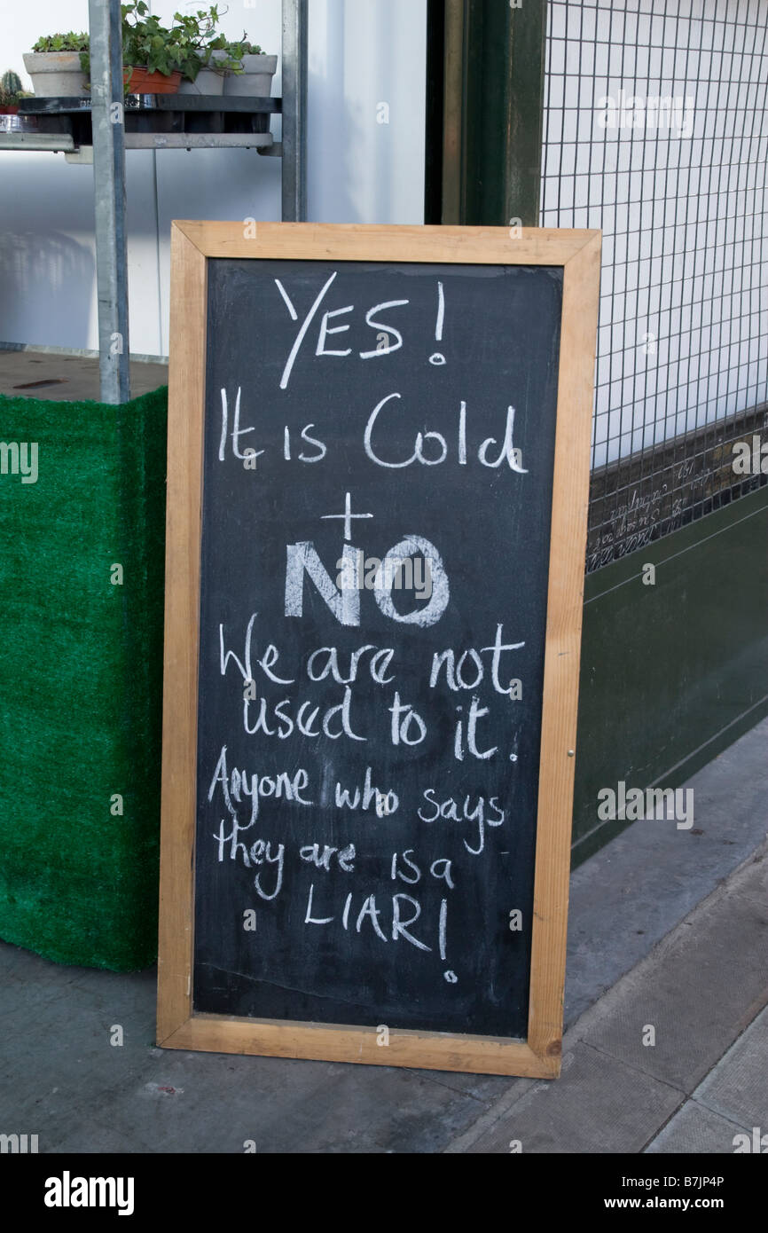 Humorous Sign about cold winter weather in Southwark South Bank London ...