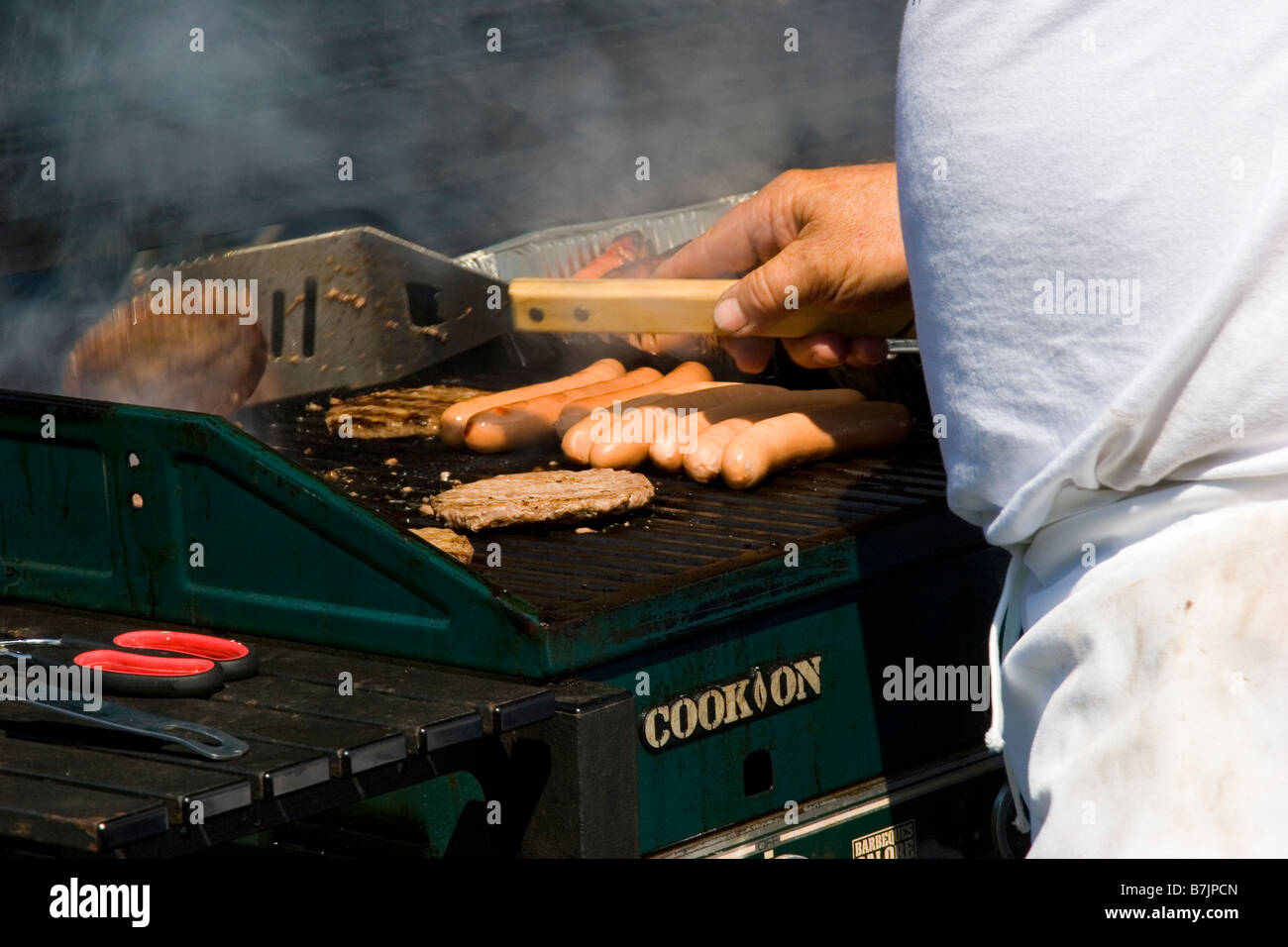 Overweight man barbecue grill hi-res stock photography and images - Alamy