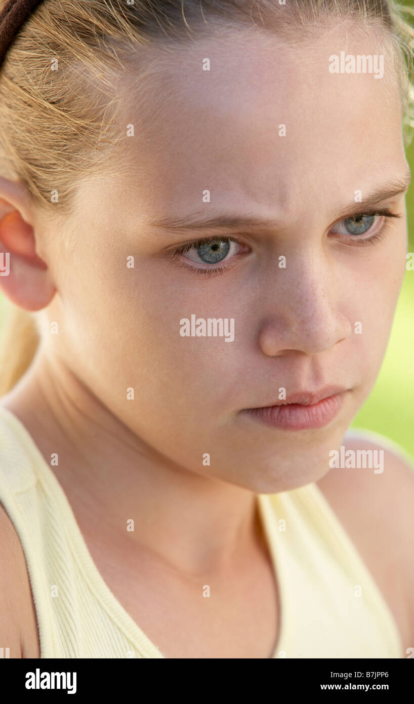 Portrait Of Girl Looking Upset Stock Photo - Alamy