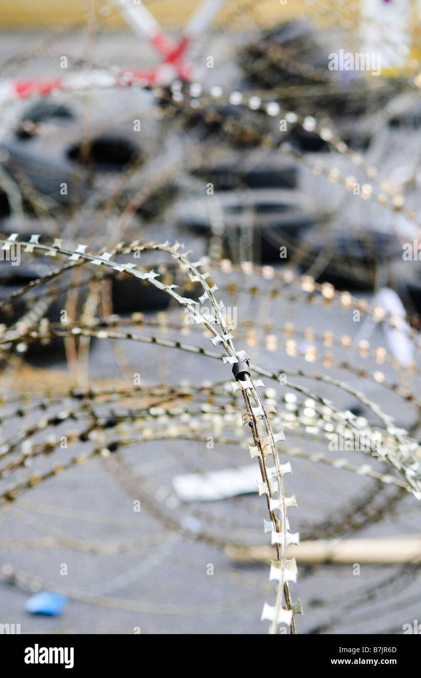 Razor wire barricades in Bangkok Thailand 2008 Stock Photo - Alamy