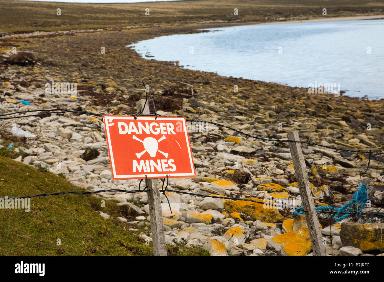A sign warning of danger of a minefield on The Falkland Islands Stock ...