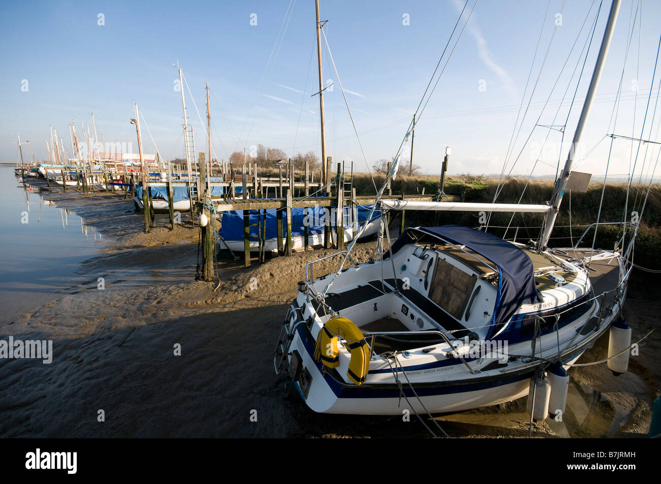 sailing boat at mooring hollow shore Faversham creek Kent england Stock ...