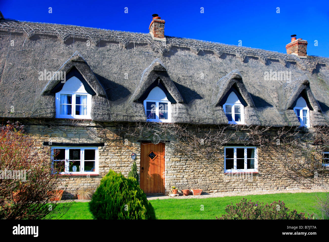 Thatched Roofed Stone Built Cottage Maxey village Cambridgeshire County ...