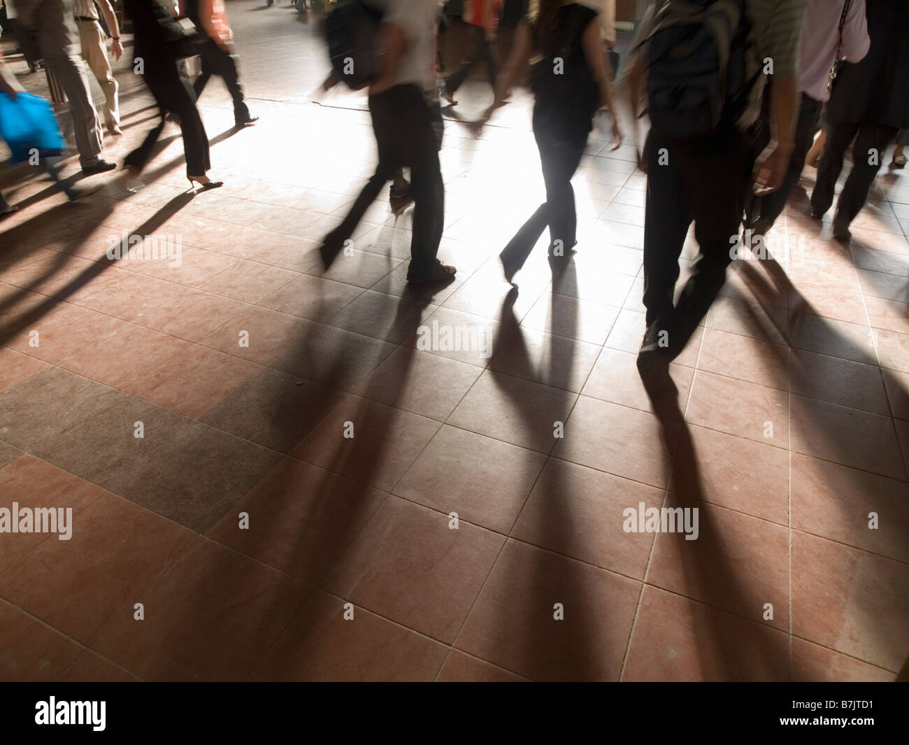 Travelers in main train station during morning rush hour Stock Photo ...