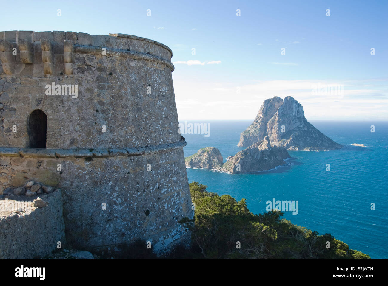 Tower of "Es Savinar" and island of "Es Vedrá" in the background, Ibiza ...