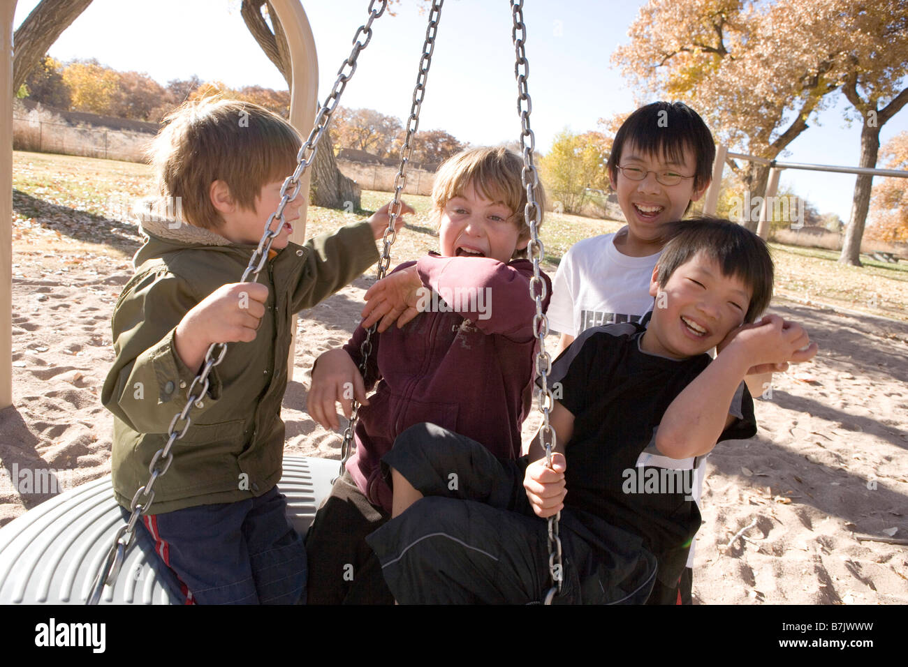 Kids multicultural swing hi-res stock photography and images - Alamy