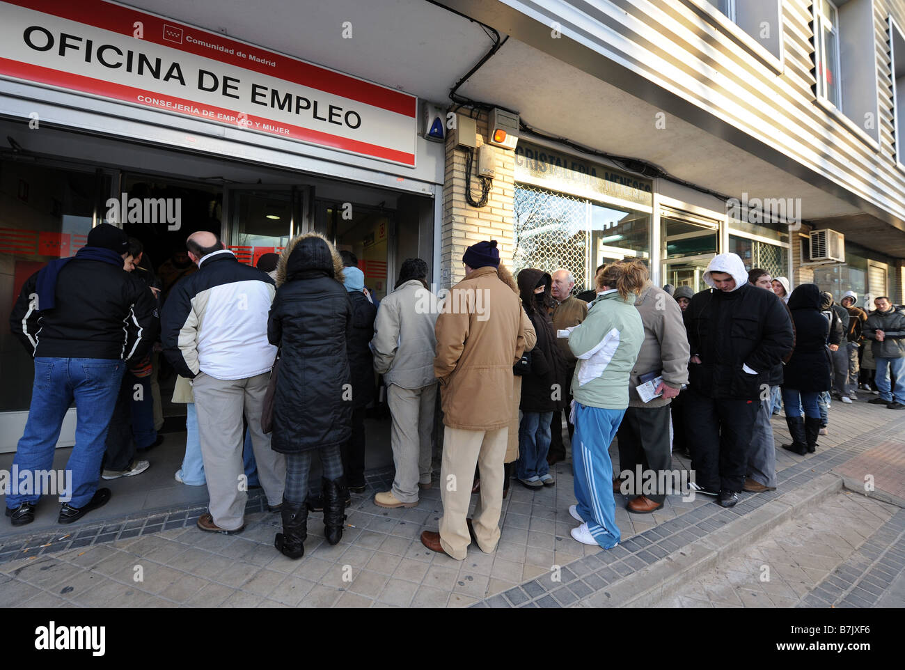 People queue up at a job center in Madrid Spain Stock Photo - Alamy