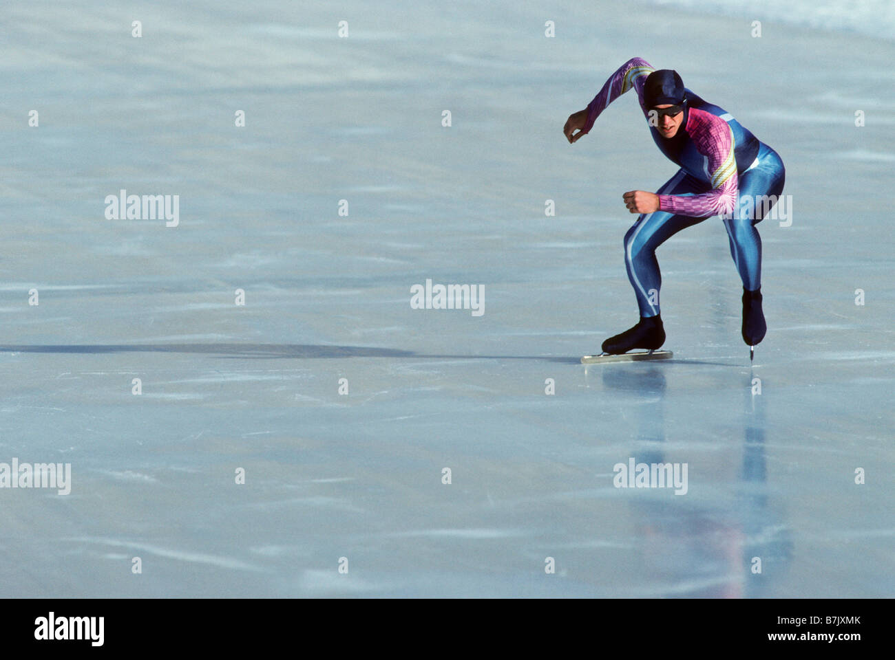 Male speed skater in action at the start Stock Photo - Alamy