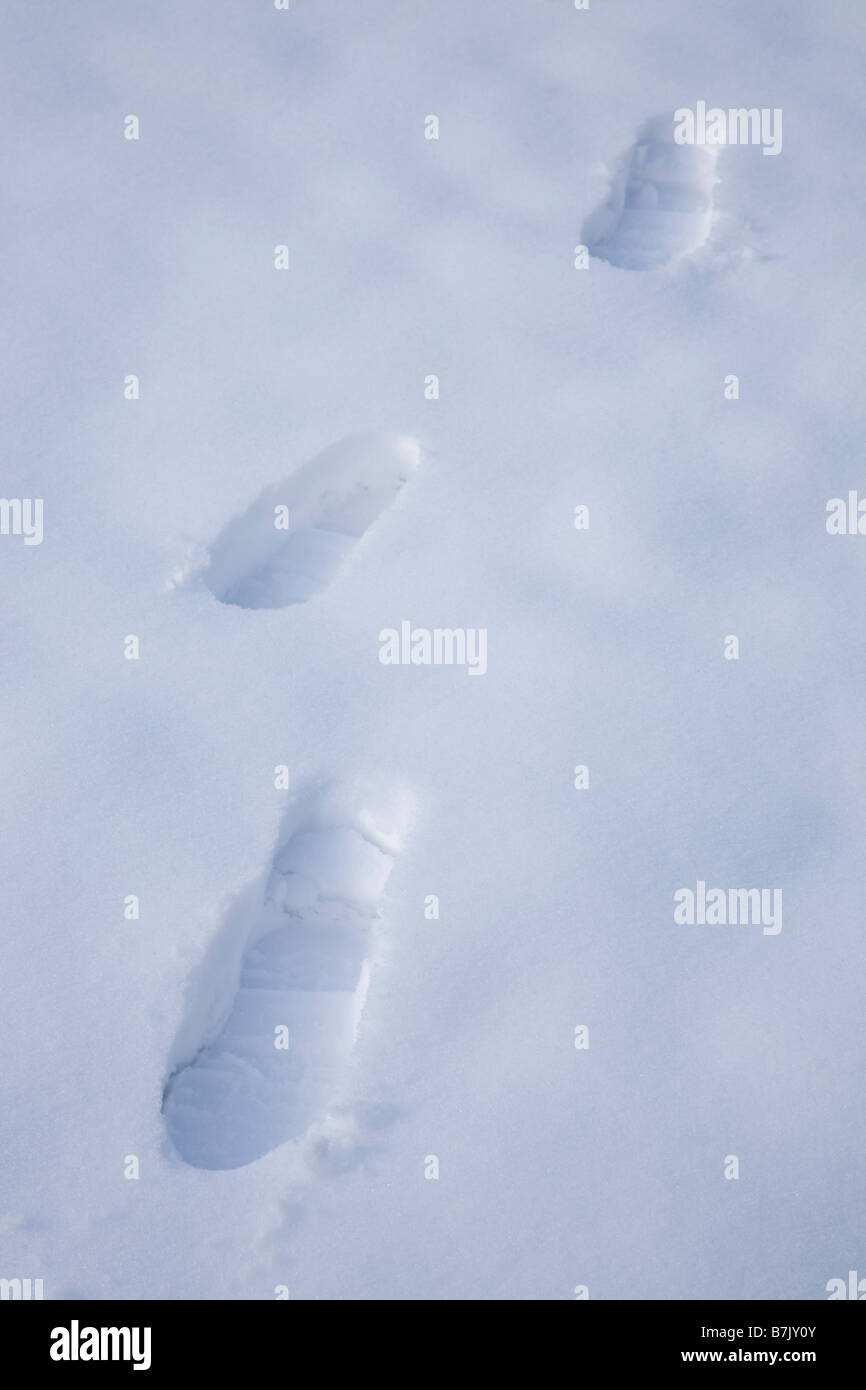 Foot prints snow direction cold temperature footprint hi-res stock ...