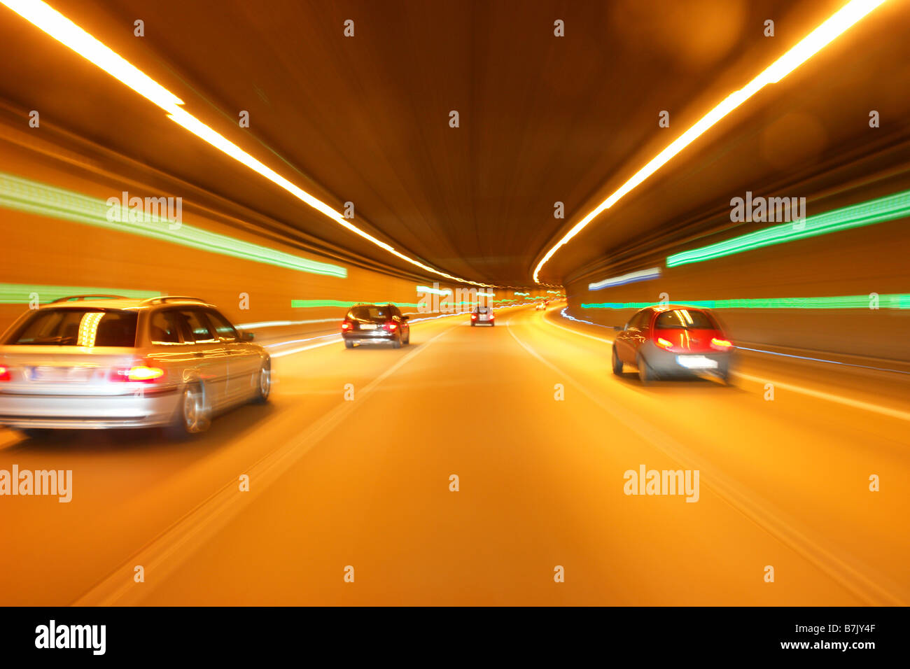 Speeding car through highway tunnel hi-res stock photography and images ...
