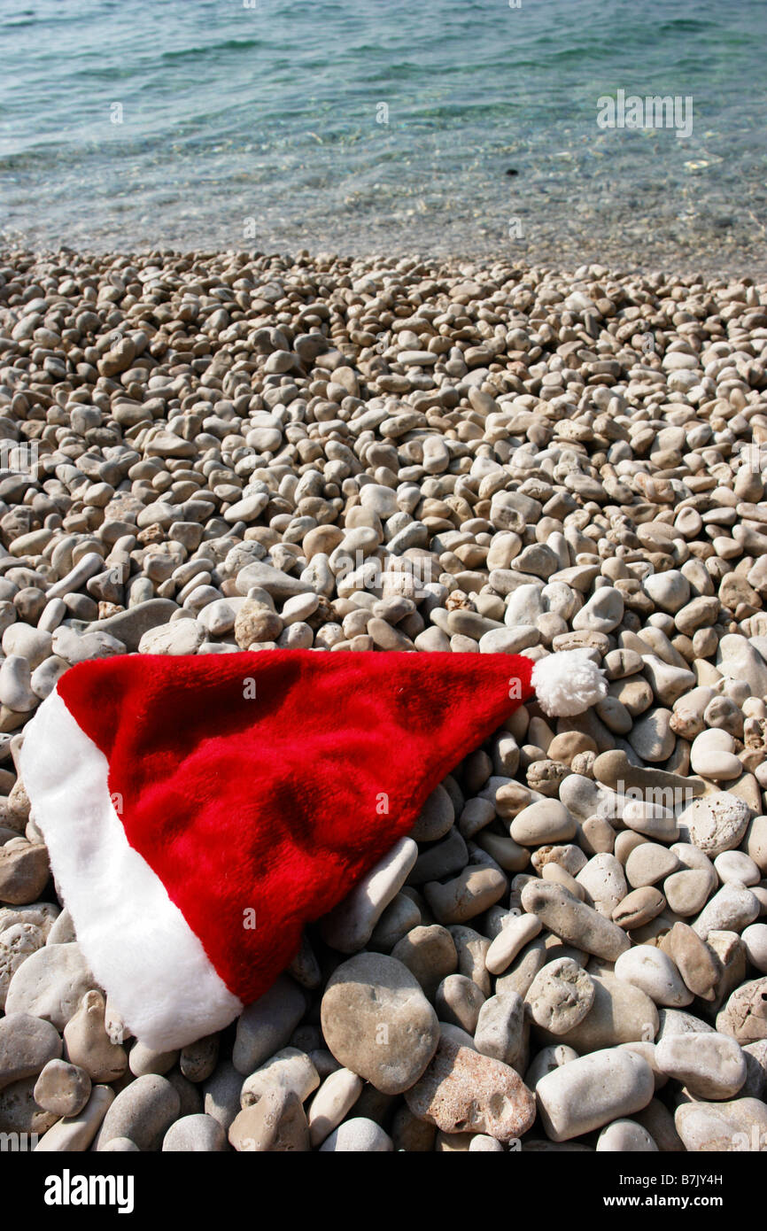santa cap at the beach Stock Photo - Alamy
