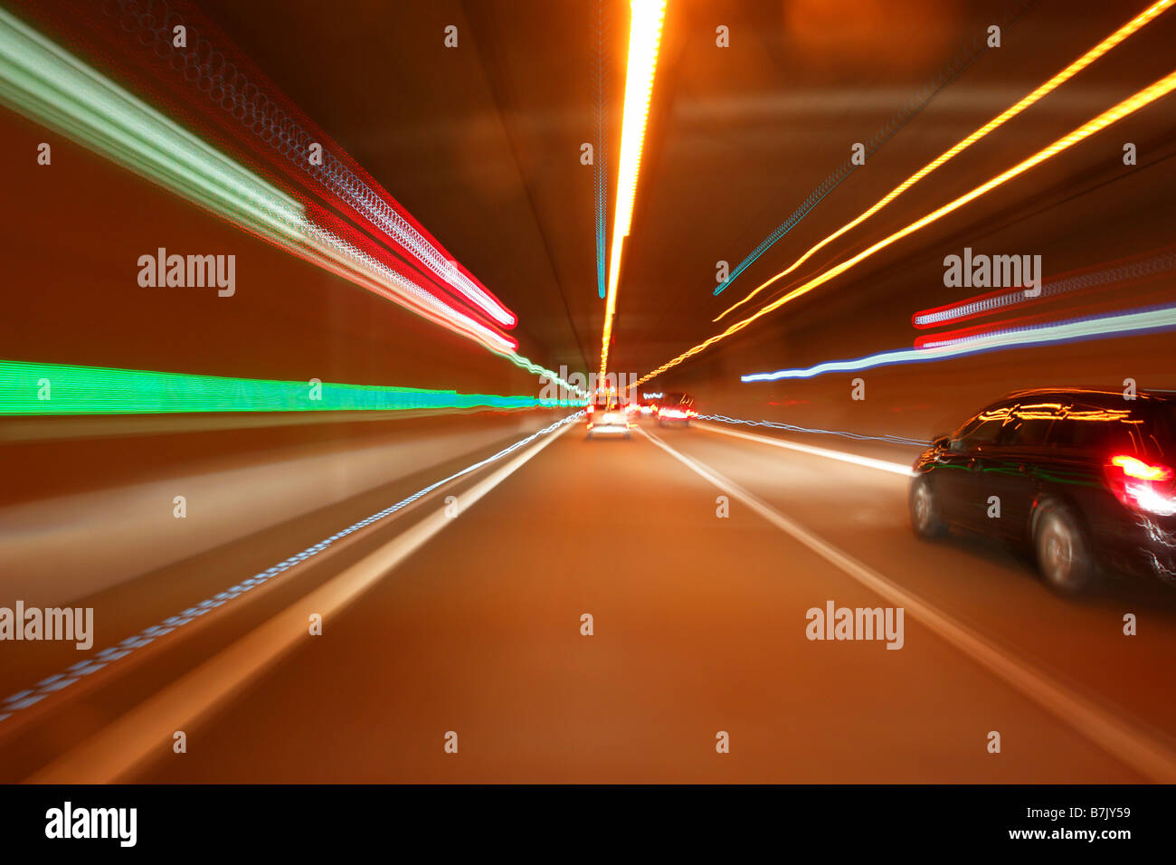 Car driving through a tunnel Stock Photo - Alamy