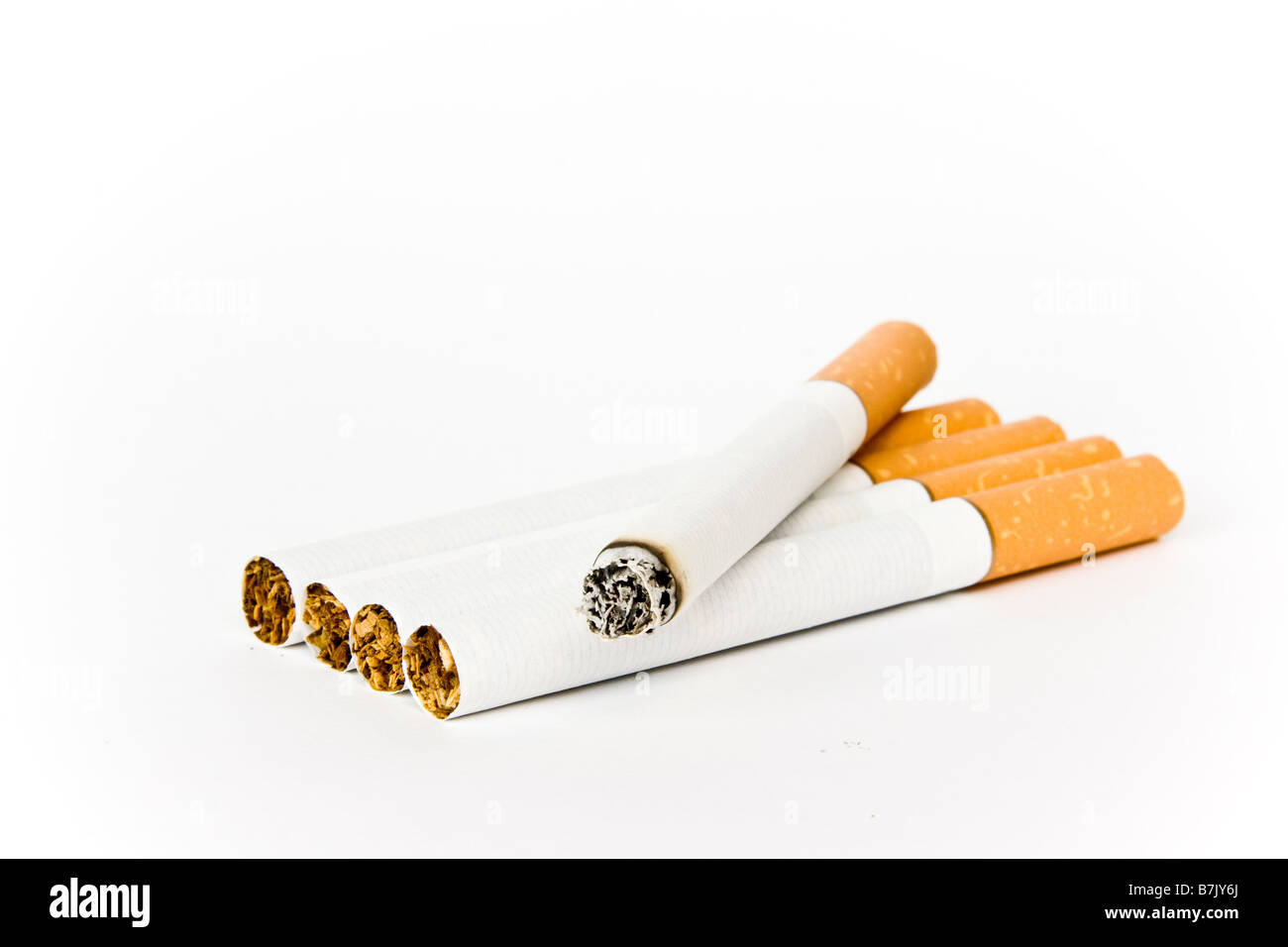 cigarettes isolated on white Stock Photo - Alamy