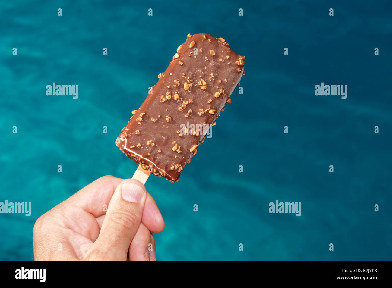 popsicle against a swimming pool Stock Photo - Alamy