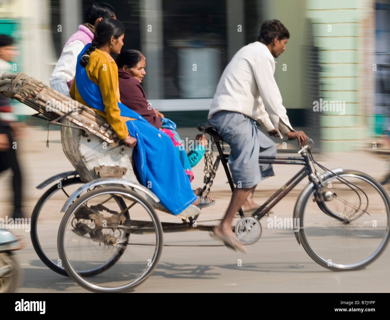 A bicycle rickshaw at work Stock Photo - Alamy
