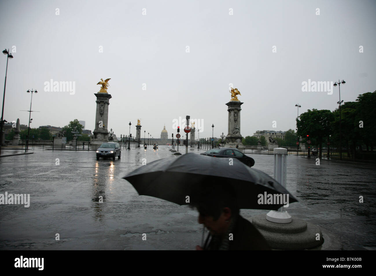 Paris Tourism in Rain Stock Photo - Alamy