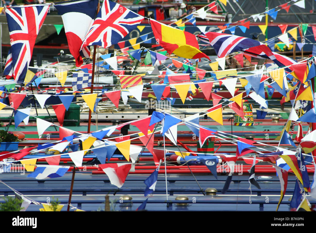 Bunting on longboats in Little Venice London Stock Photo - Alamy