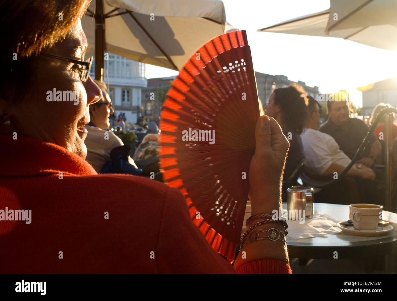 woman with red fan spain Stock Photo - Alamy