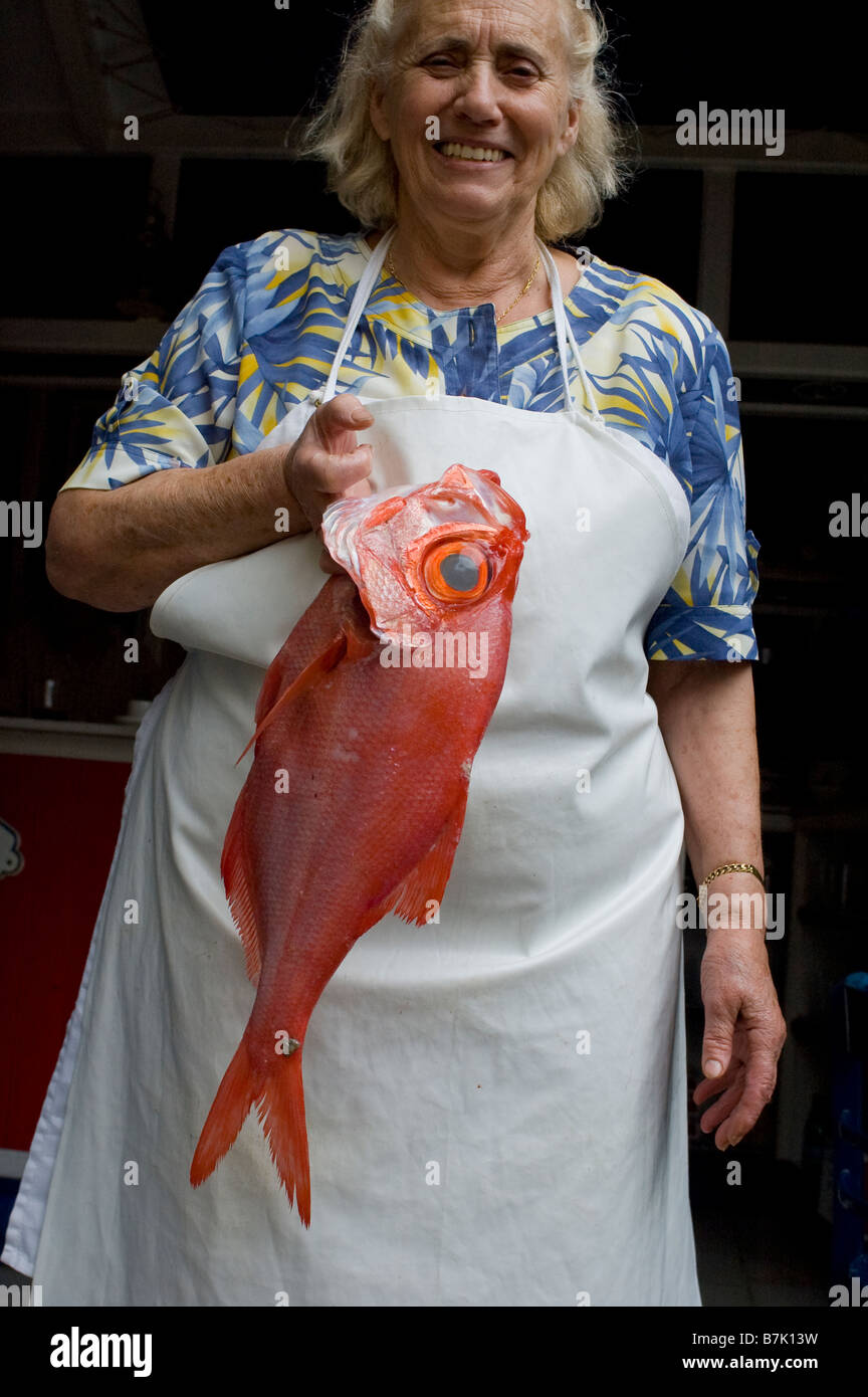 Holding red snapper fish hi-res stock photography and images - Alamy