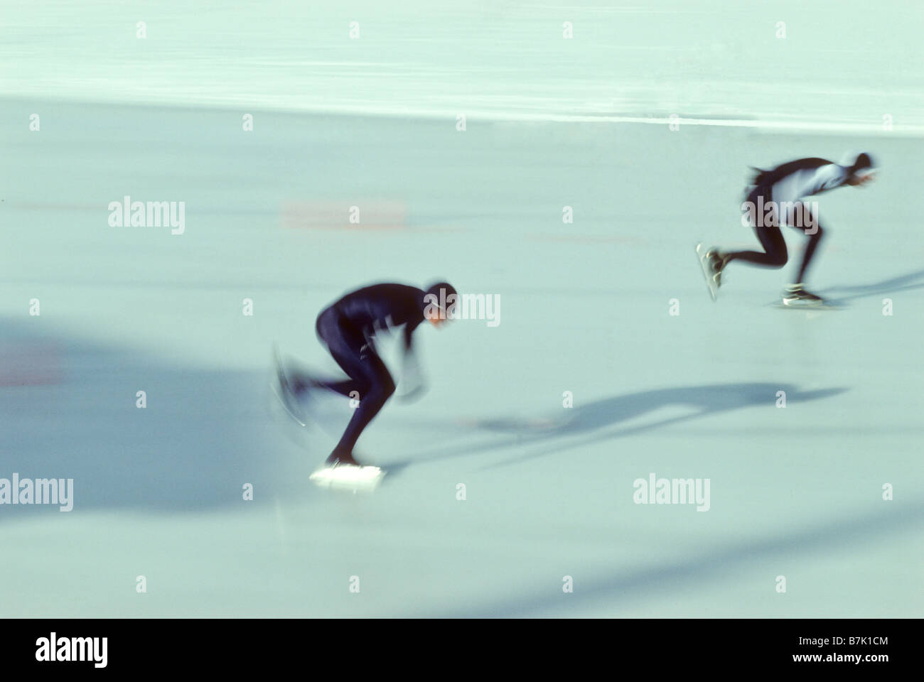 Male speed skaters in action Stock Photo - Alamy