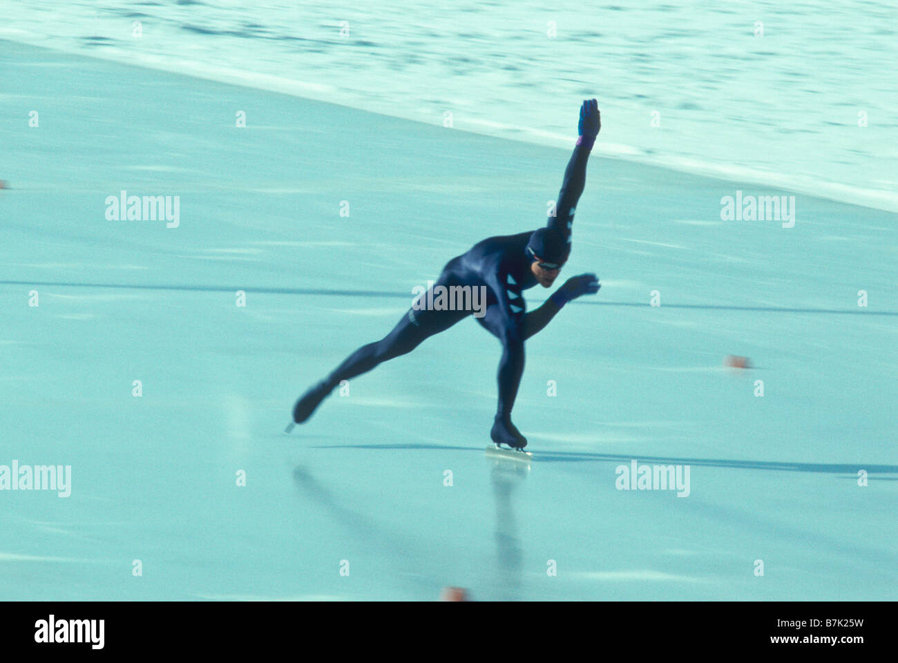 Male speed skater in action Stock Photo - Alamy