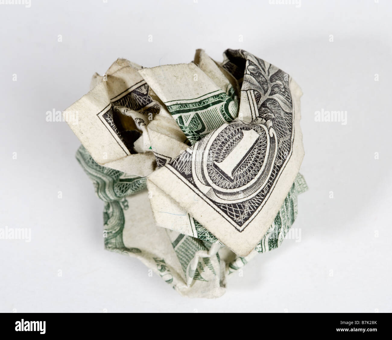A dollar bill wadded up Stock Photo - Alamy