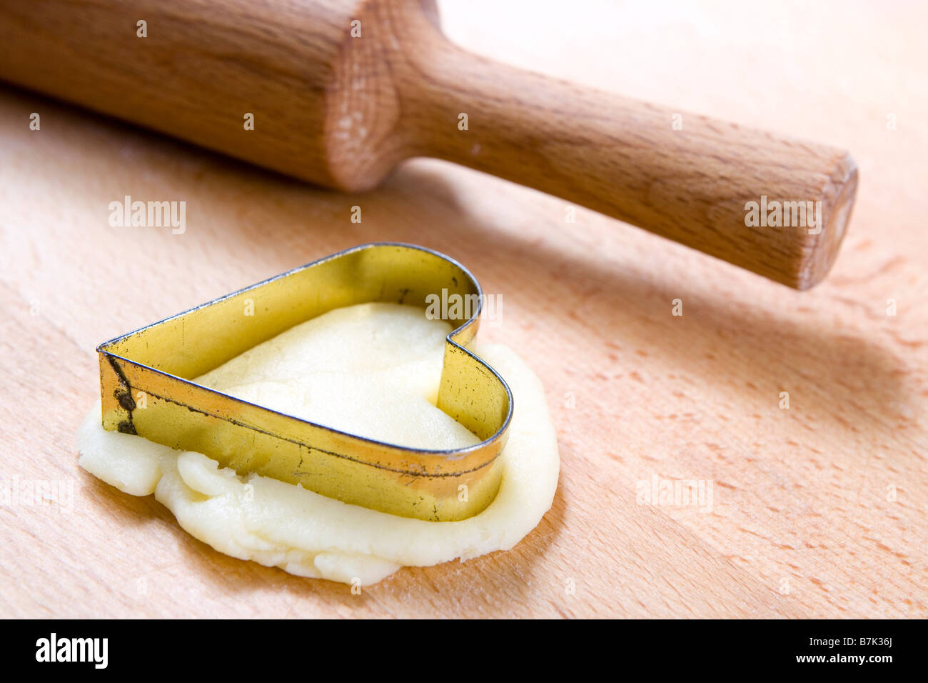 old heart shaped cookie cutter Stock Photo - Alamy