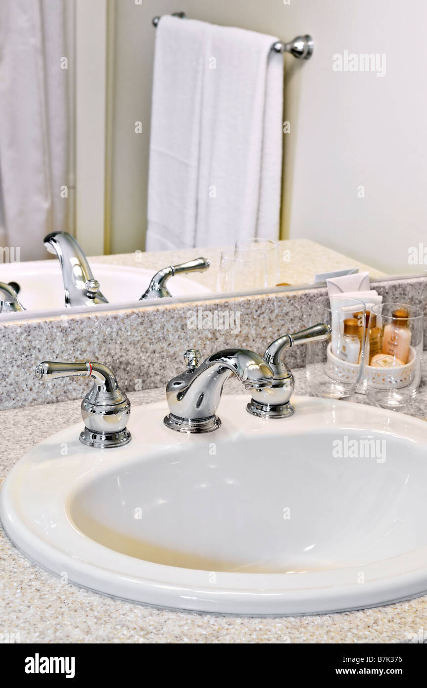 Bathroom interior with white sink faucet and mirror Stock Photo - Alamy