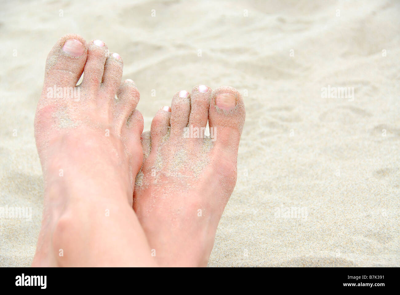 Crossed toes hi-res stock photography and images - Alamy
