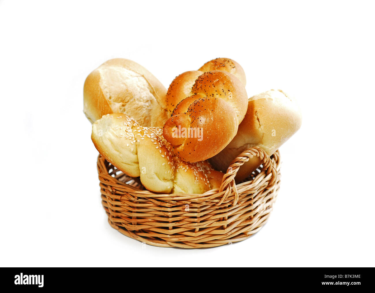 Small basket filled with buns isolated on white background Stock Photo ...