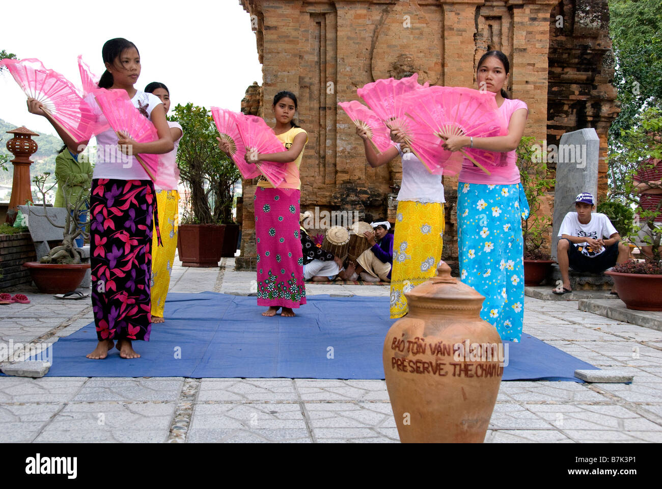 Female Cham dancers performing to traditional Cham dances in an effort ...