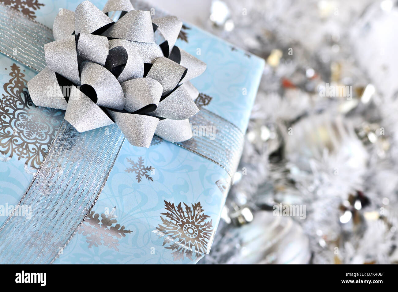 Christmas gift wrapped with bow hi-res stock photography and images - Alamy