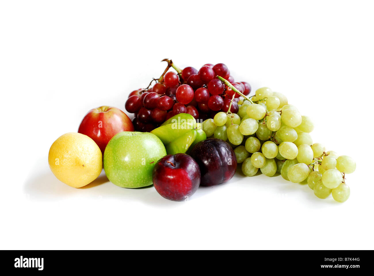Assorted fruits on white background Stock Photo - Alamy