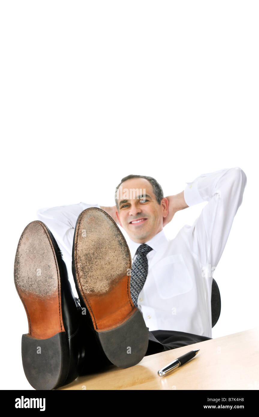 Lazy businessman with feet up hi-res stock photography and images - Alamy