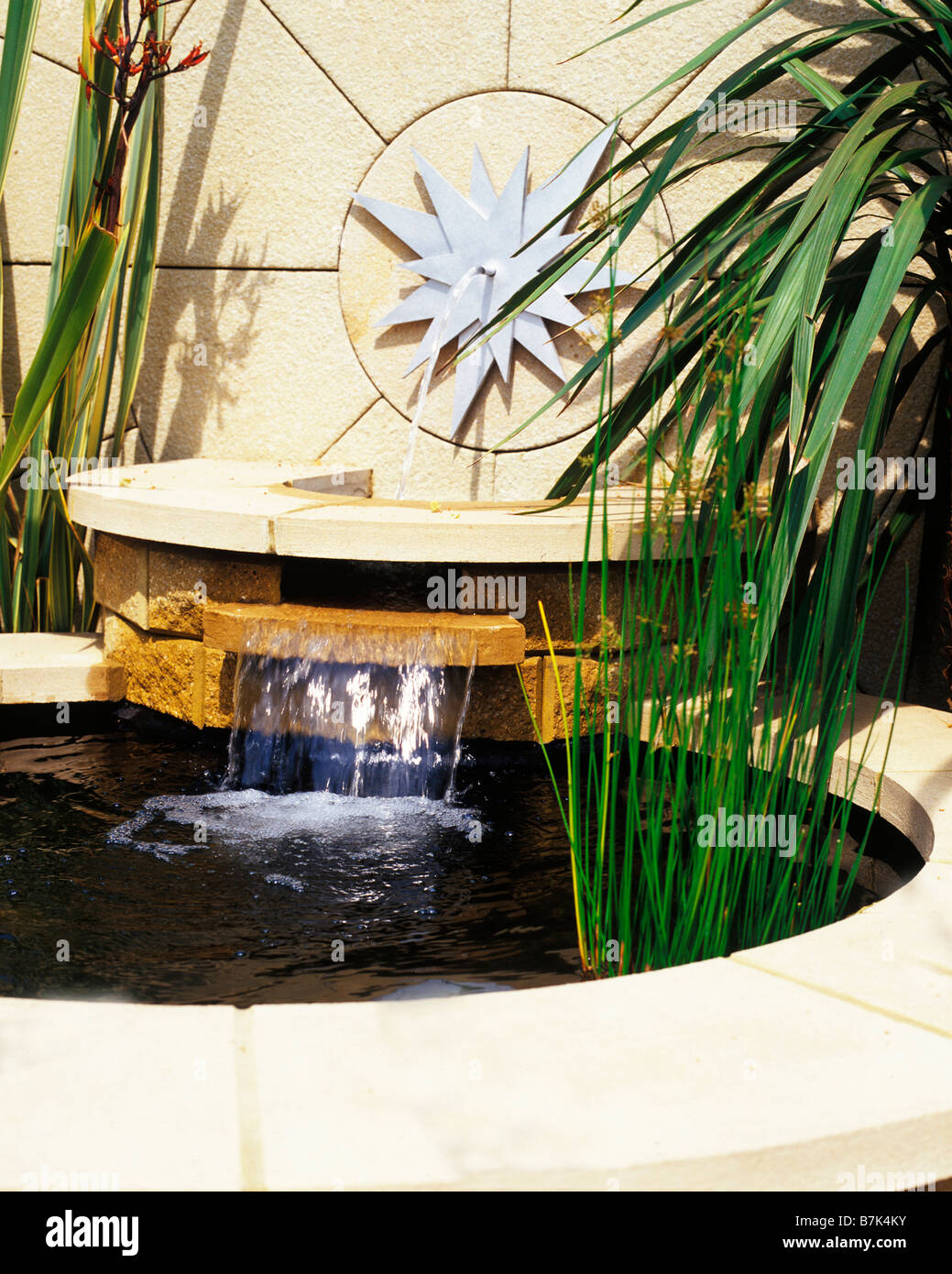 WATER FEATURE MADE FROM REFORMED STONE Stock Photo - Alamy