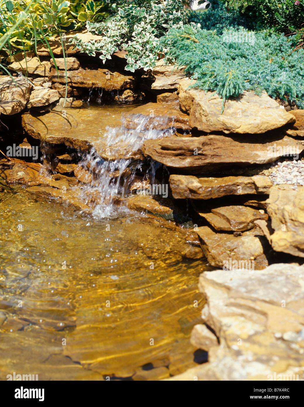 GARDEN WATERFALL AND POND INCORPORATING SANDSTONE Stock Photo - Alamy