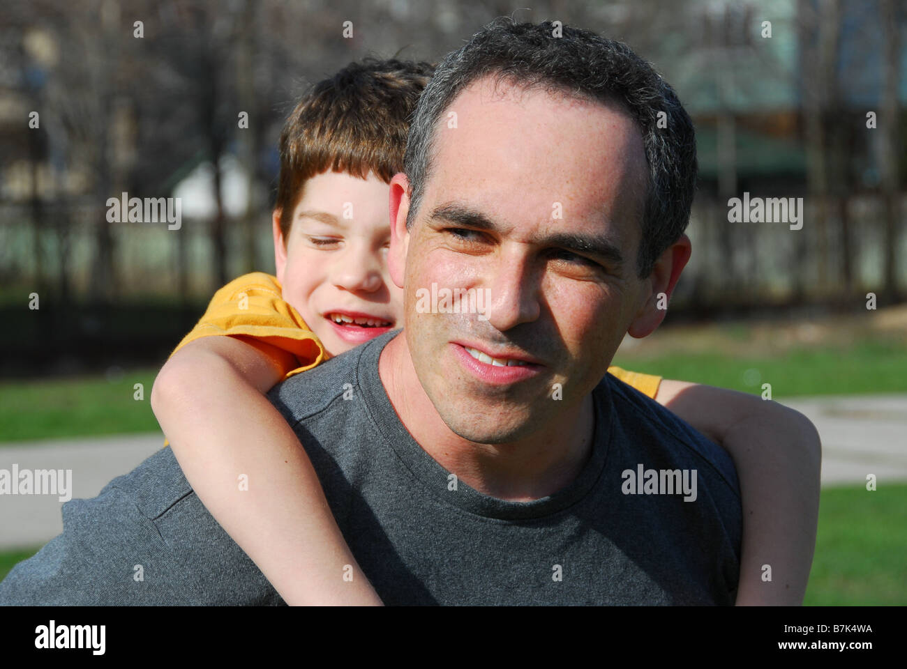 Portrait of father and son Stock Photo - Alamy