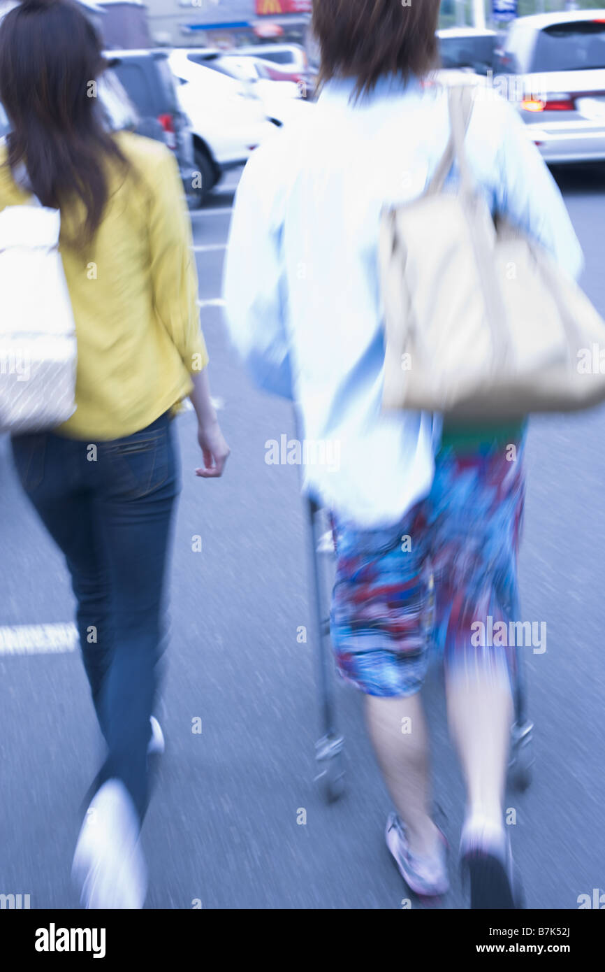 Couple Pushing a Shopping Cart,rear view Stock Photo - Alamy